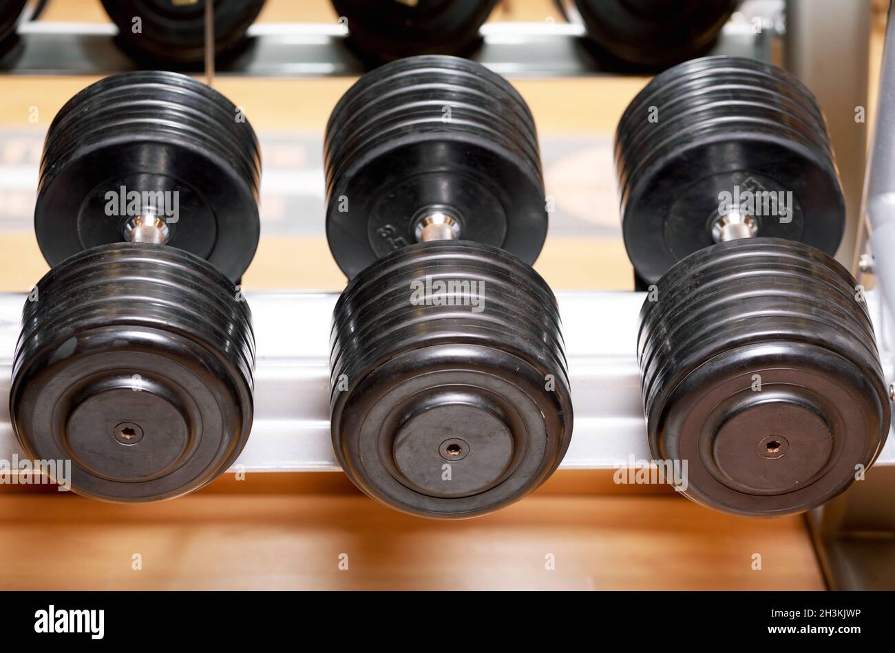 Different sizes weights dumbbell hi-res stock photography and images ...