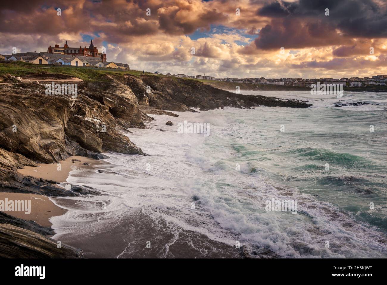 Rough sea and the wild rocky coastline of the iconic Fistral Bay in ...