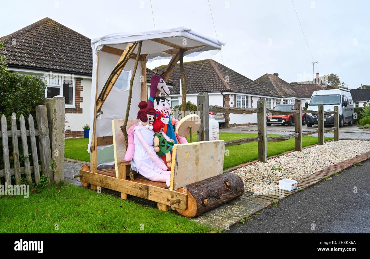 Worthing, Sussex, UK. 29th Oct, 2021. This Flintsones scarecrow taking ...