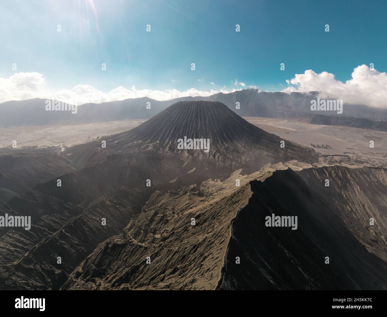 Cinematic shot aerial view of beautiful Mount Bromo volcano peak with ...