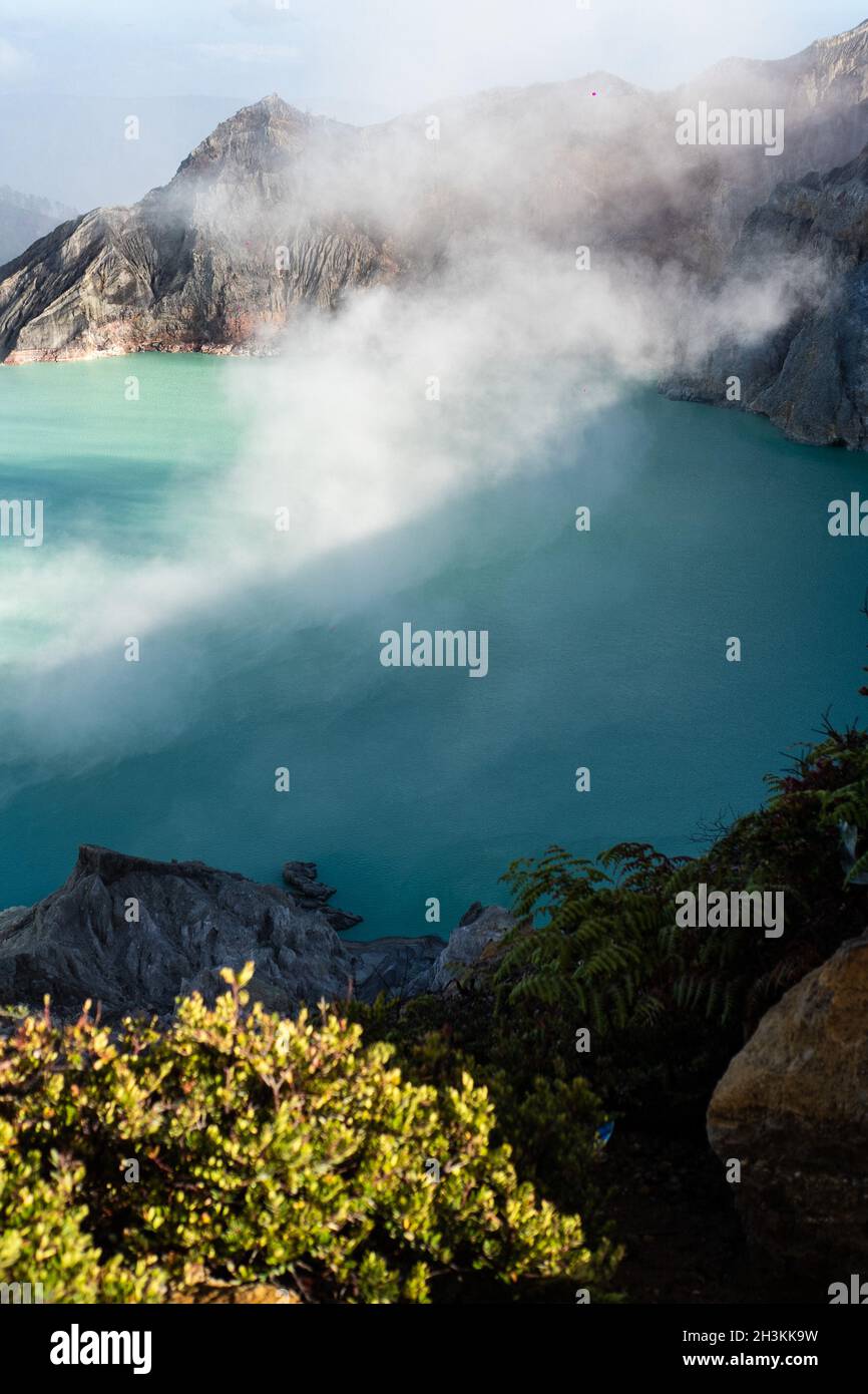 Aerial view of beautiful Ijen volcano with acid lake and sulfur gas ...