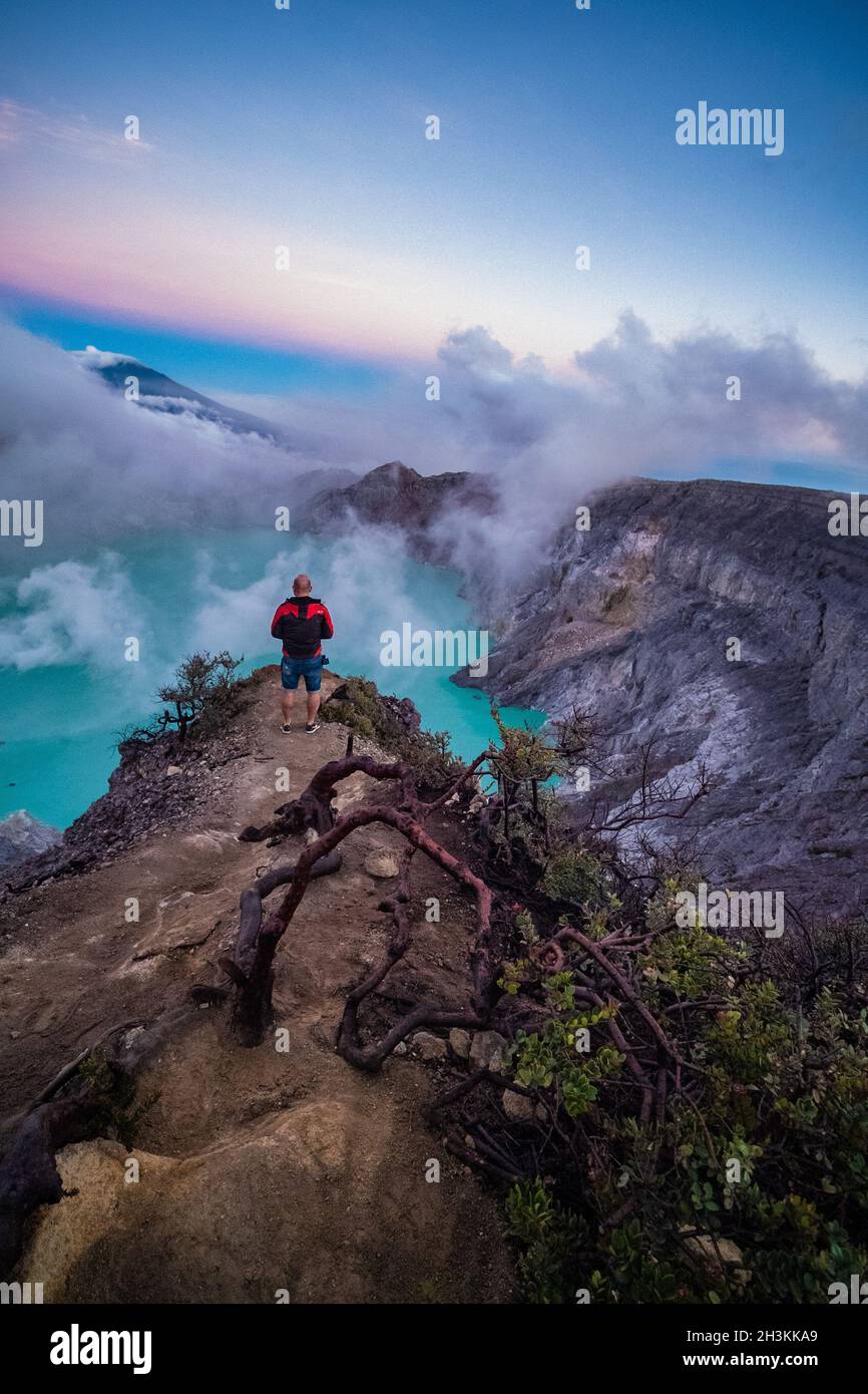 Volcano eruption man hi-res stock photography and images - Alamy