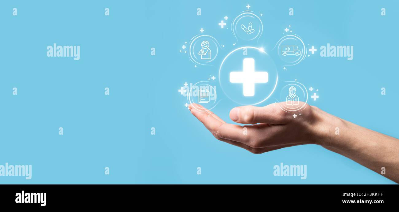 Businessman hold virtual plus medical network connection icons. Covid ...