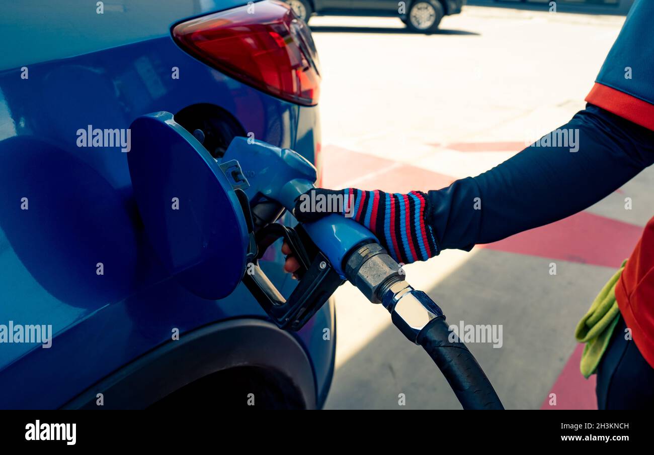 Car fueling at gas station. Refuel fill up with petrol gasoline. Petrol ...