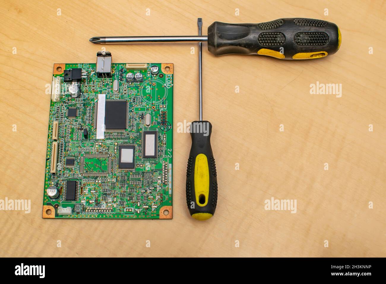 electronic circuit, a board with electronic components and a ...