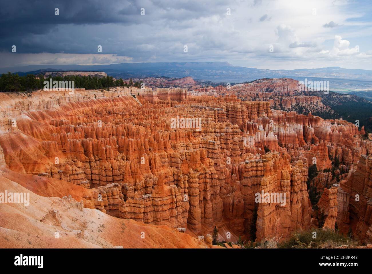 Bryce Amphitheater iconic rock formations under dramatic dark storm ...