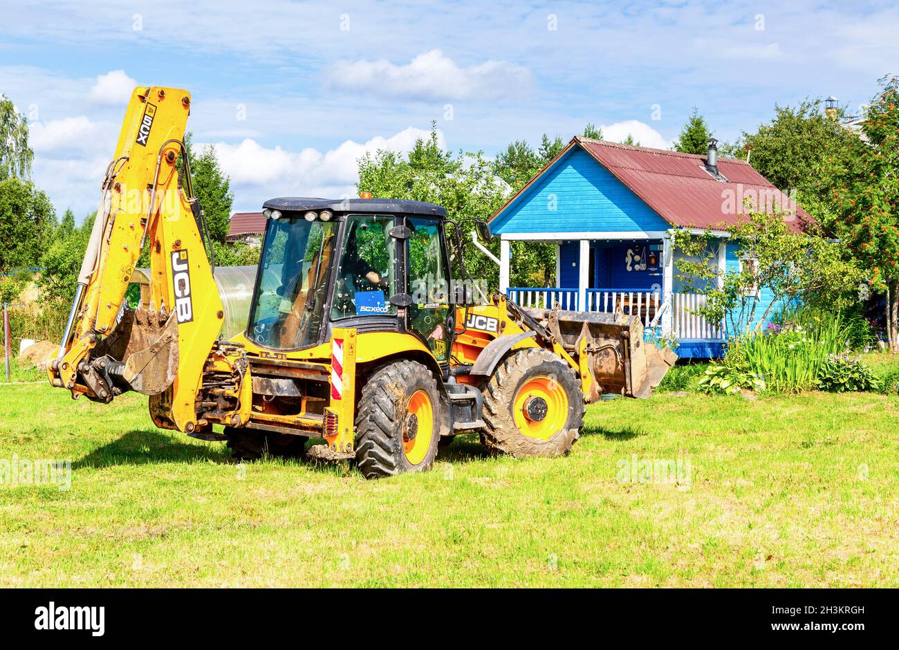 Moscow, Russia - July 30, 2021: JCB wheeled tractor excavating at the ...