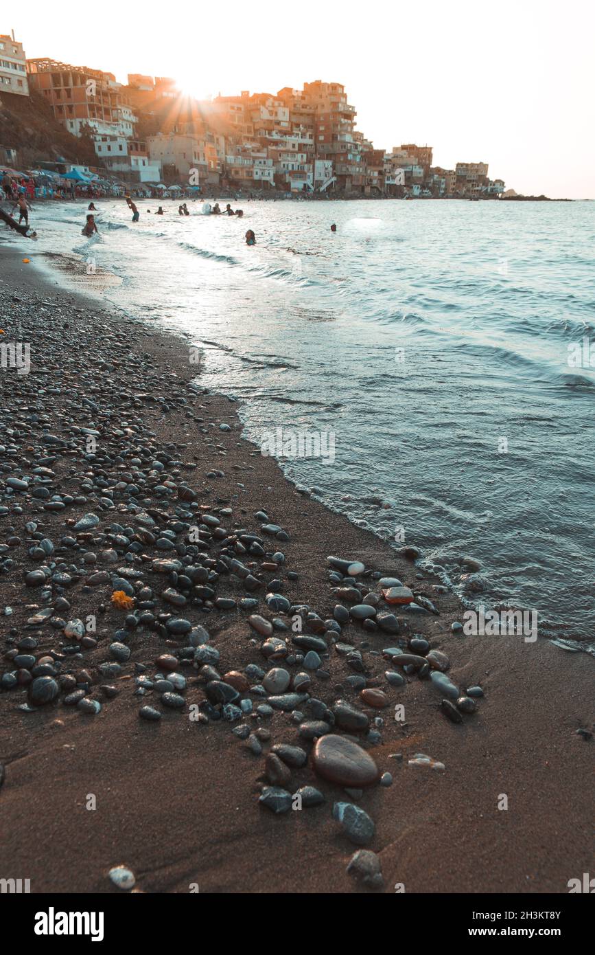Blue wave on beautiful sand Stock Photo - Alamy