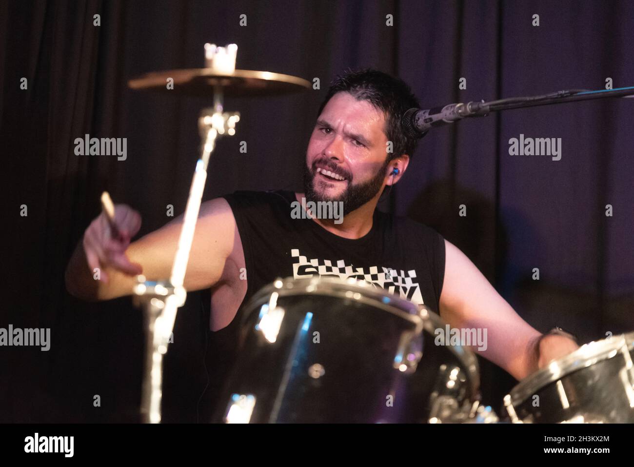 Man playing drums heavy metal band hi-res stock photography and images ...