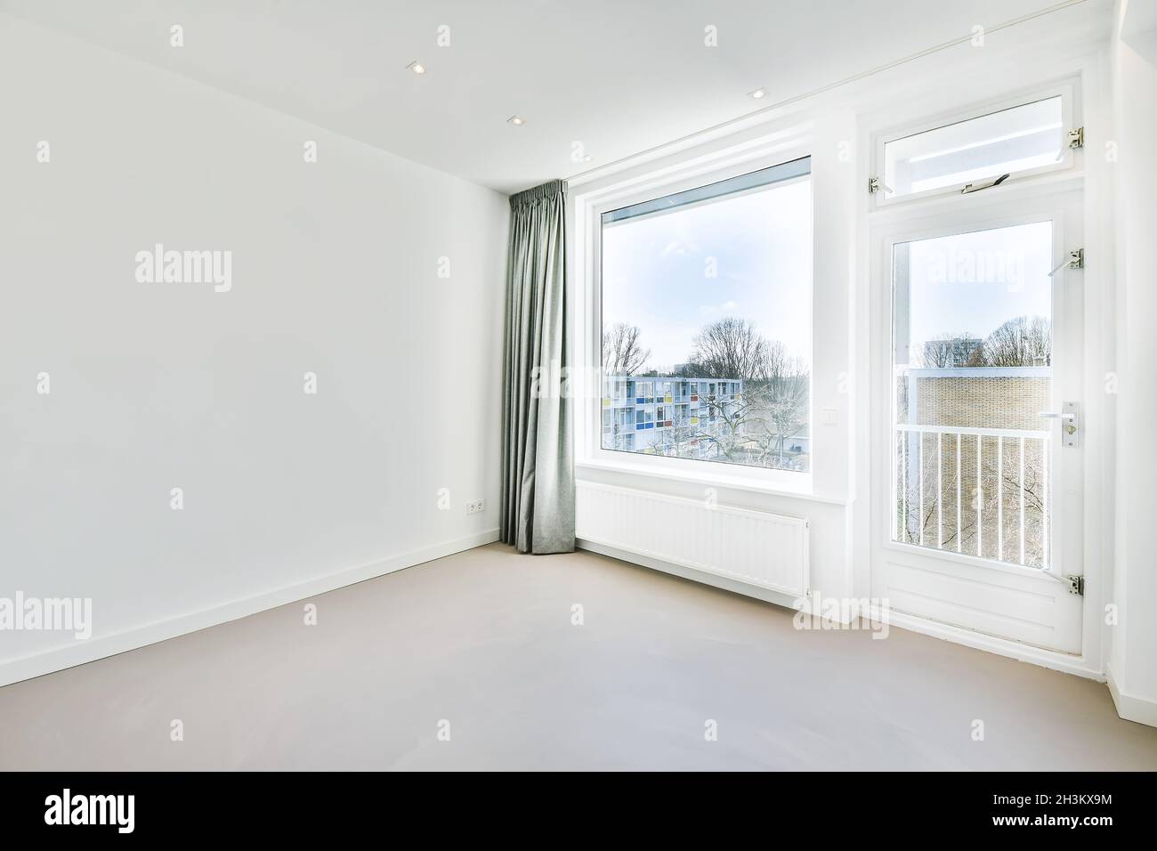 Light room interior with big window and beautiful view Stock Photo - Alamy