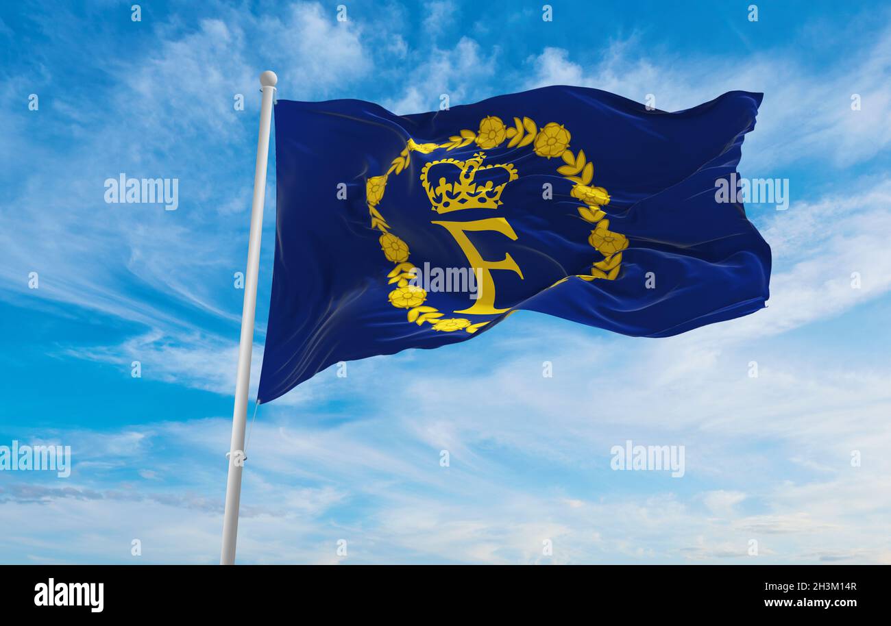 flag of Personal Queen Elizabeth II at cloudy sky background on sunset ...