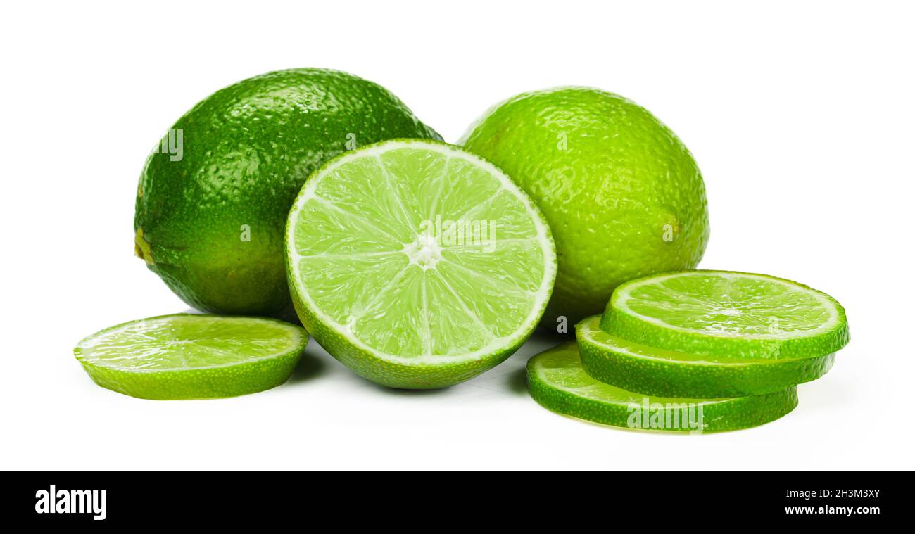 Pieces of lime isolated on white background Stock Photo - Alamy