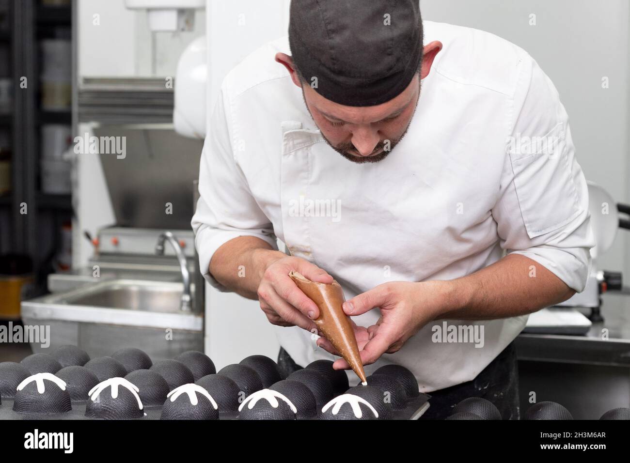 Professional confectioner hi-res stock photography and images - Alamy