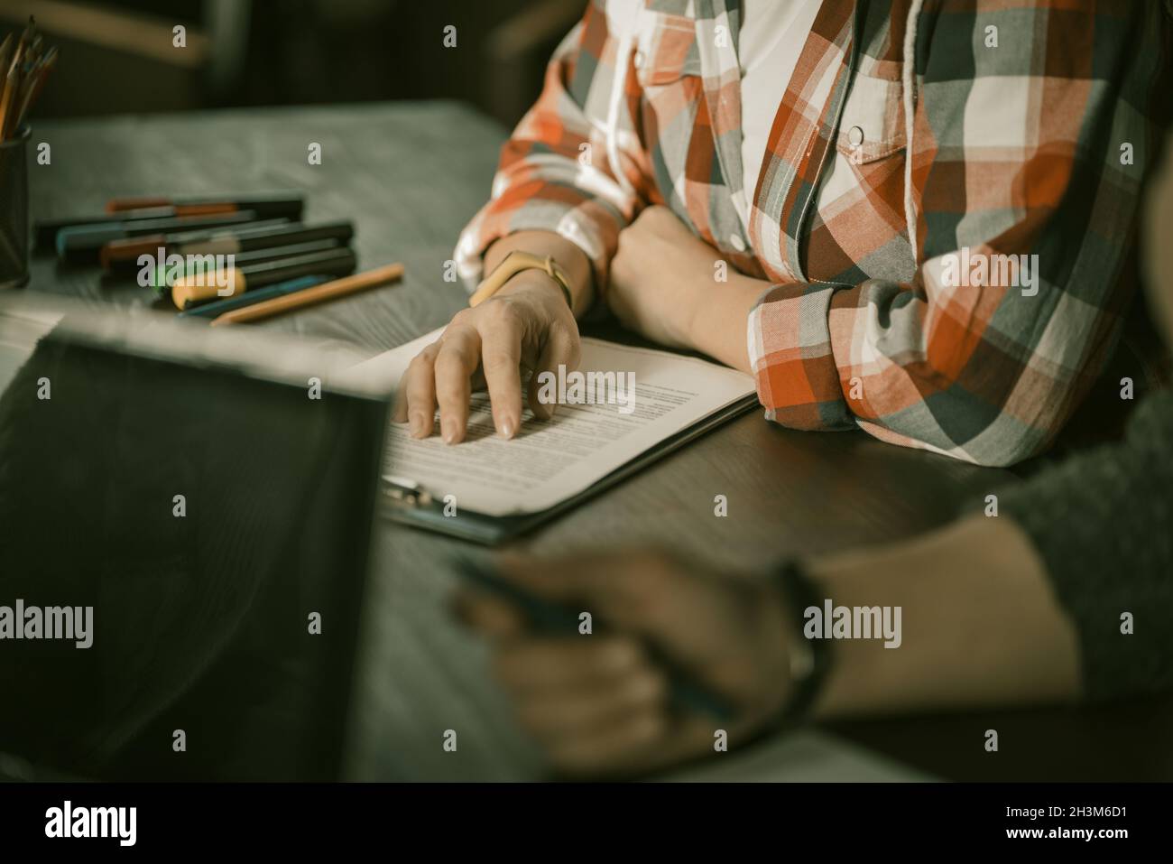 Female Hands On Folder With Documents Stock Photo - Alamy