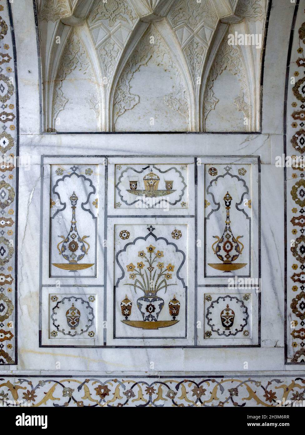 Islamic decoration inlaid into the marble tiles of the Taj Mahal - a ...