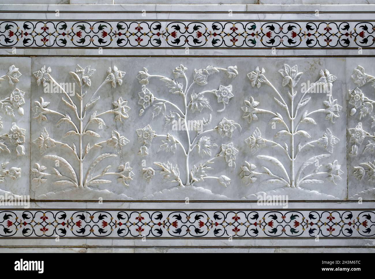Islamic decoration inlaid into the marble tiles of the Taj Mahal - a ...