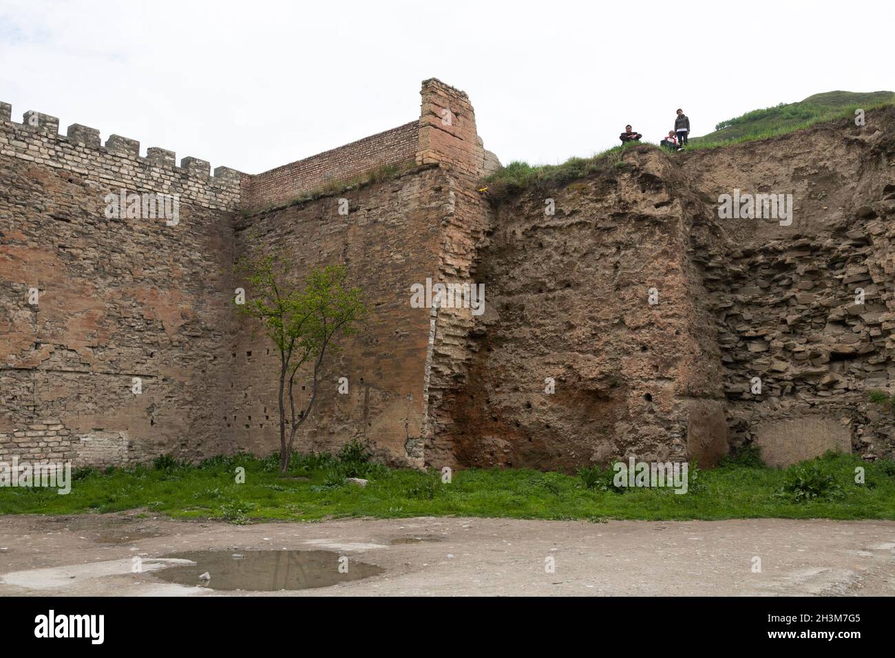 Ancient walled city / town walls which have been extensively restored ...