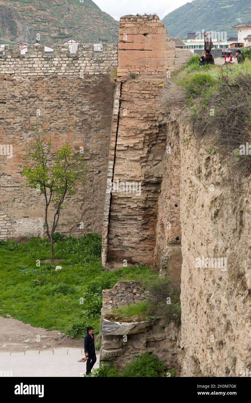 Ancient walled city / town walls which have been extensively restored ...
