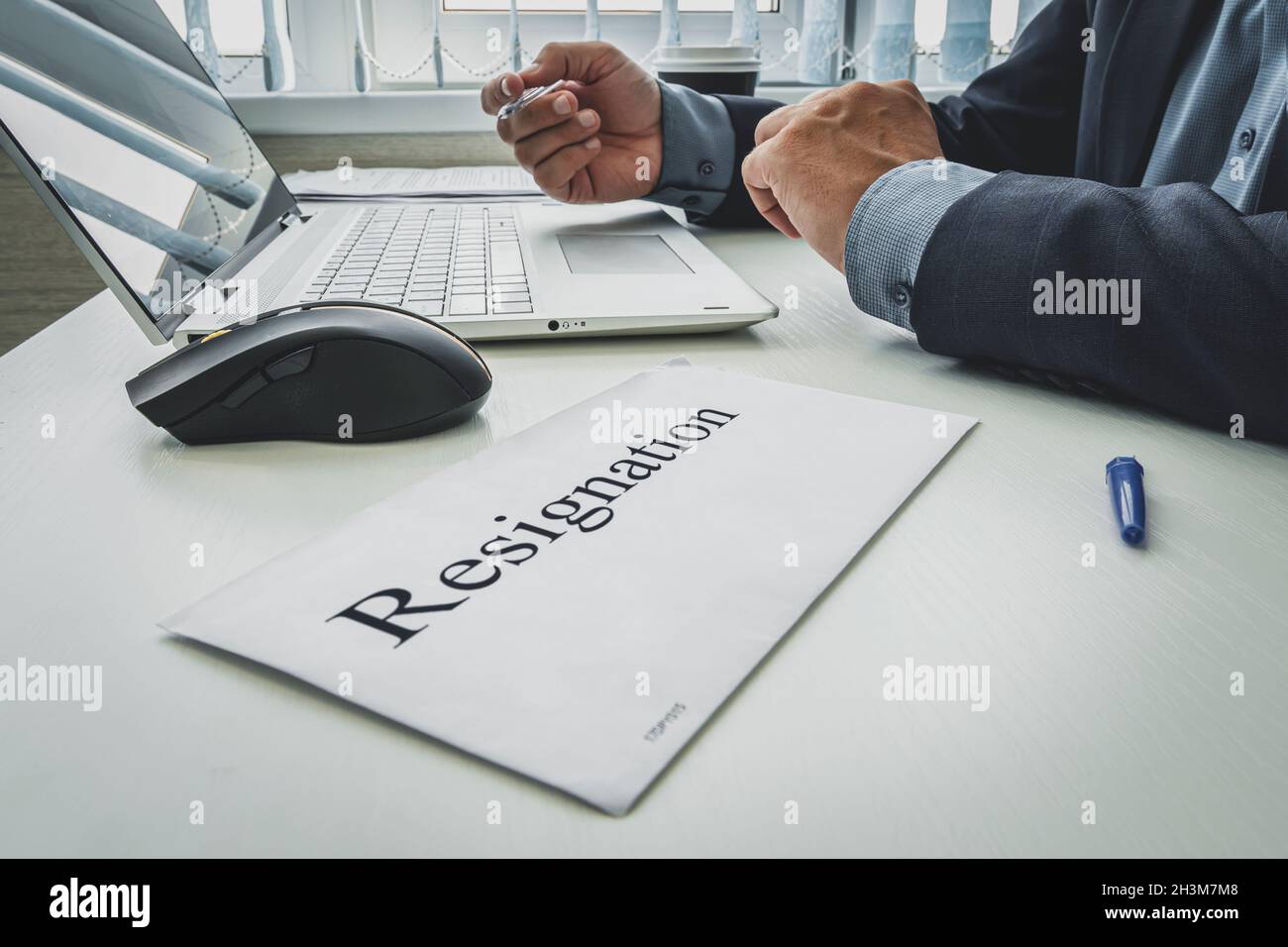 Resignation letter. Resignation letter in brown envelope. concept of ...