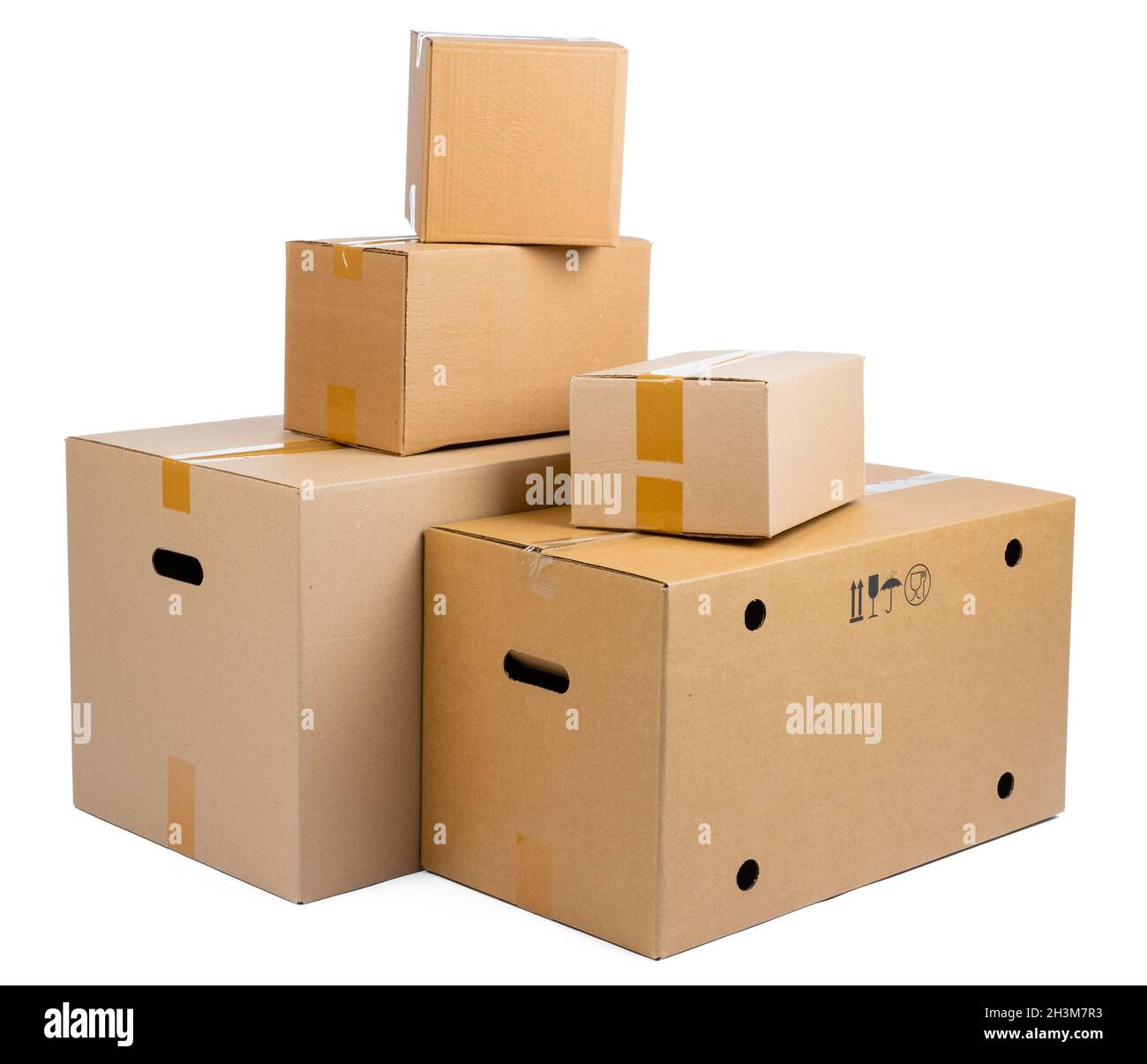 Stack of cardboard boxes isolated on white background Stock Photo - Alamy