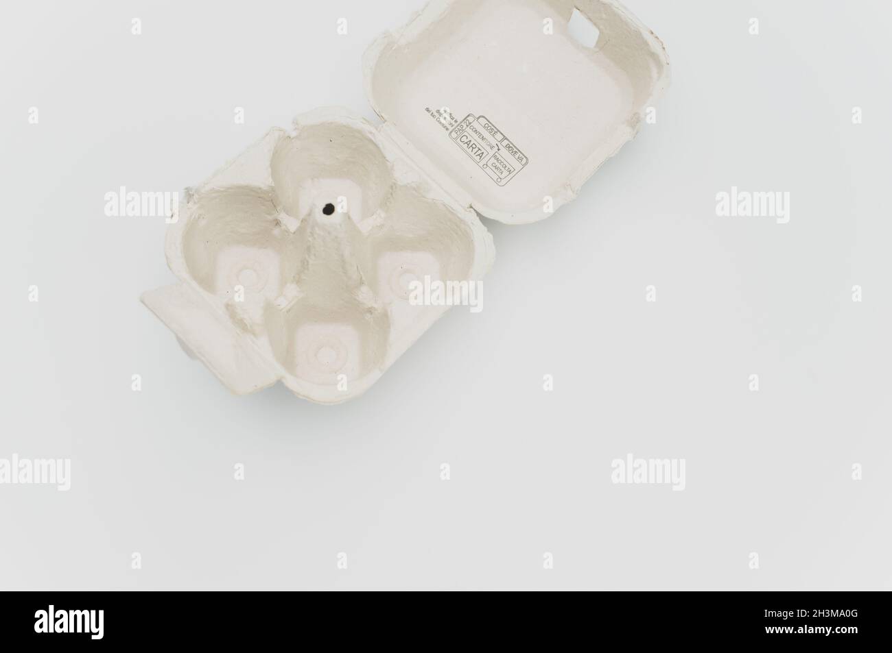 empty recycled caedboard egg box on a white background Stock Photo - Alamy