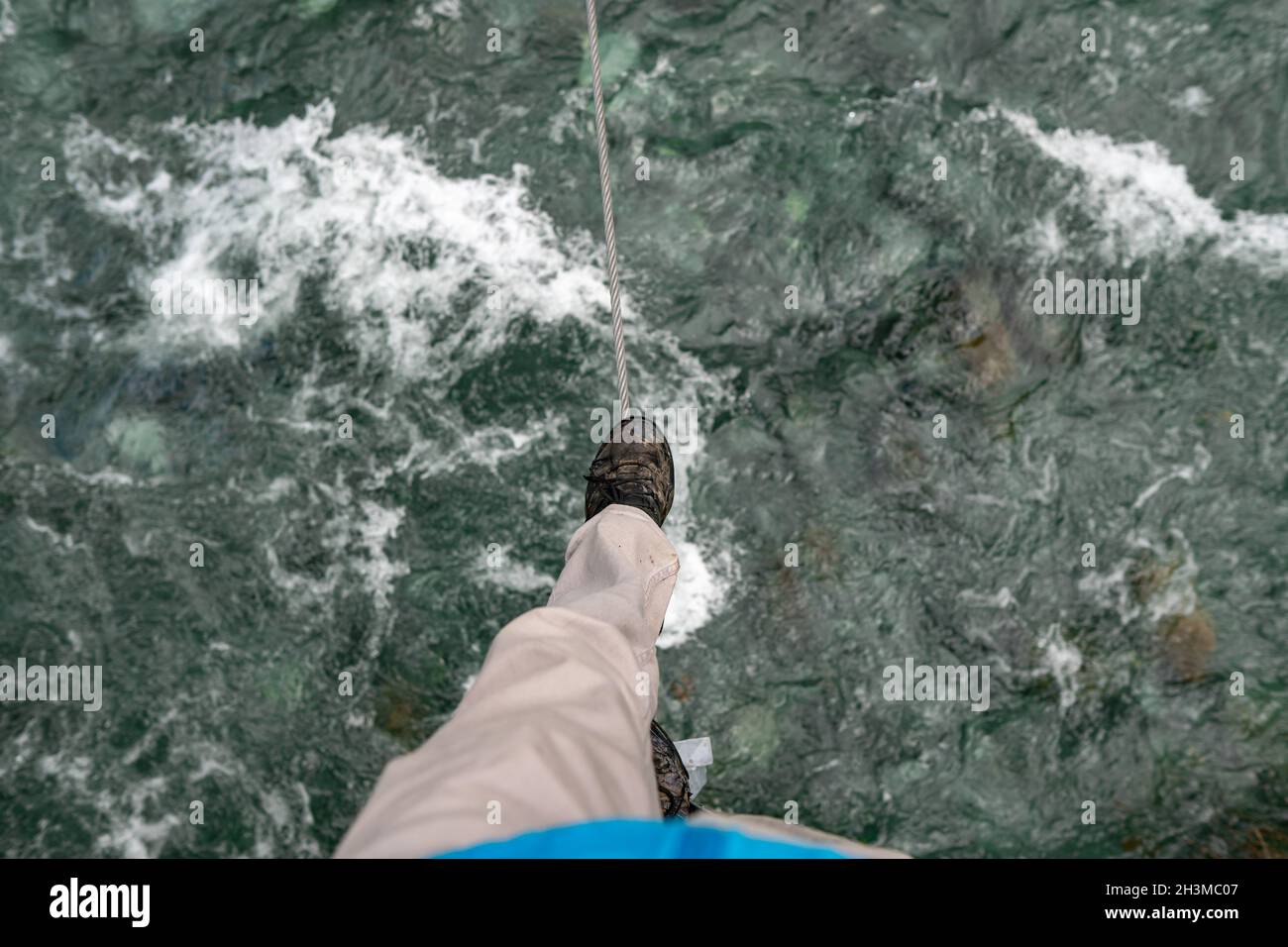 Crossing the three-rope bridge in New Zealand Stock Photo - Alamy