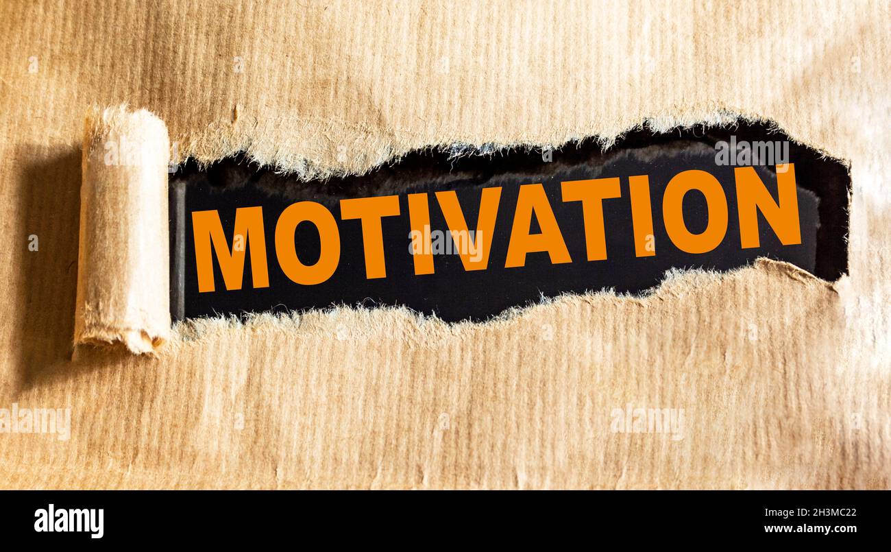 The word Motivation written on brown torn paper Stock Photo - Alamy