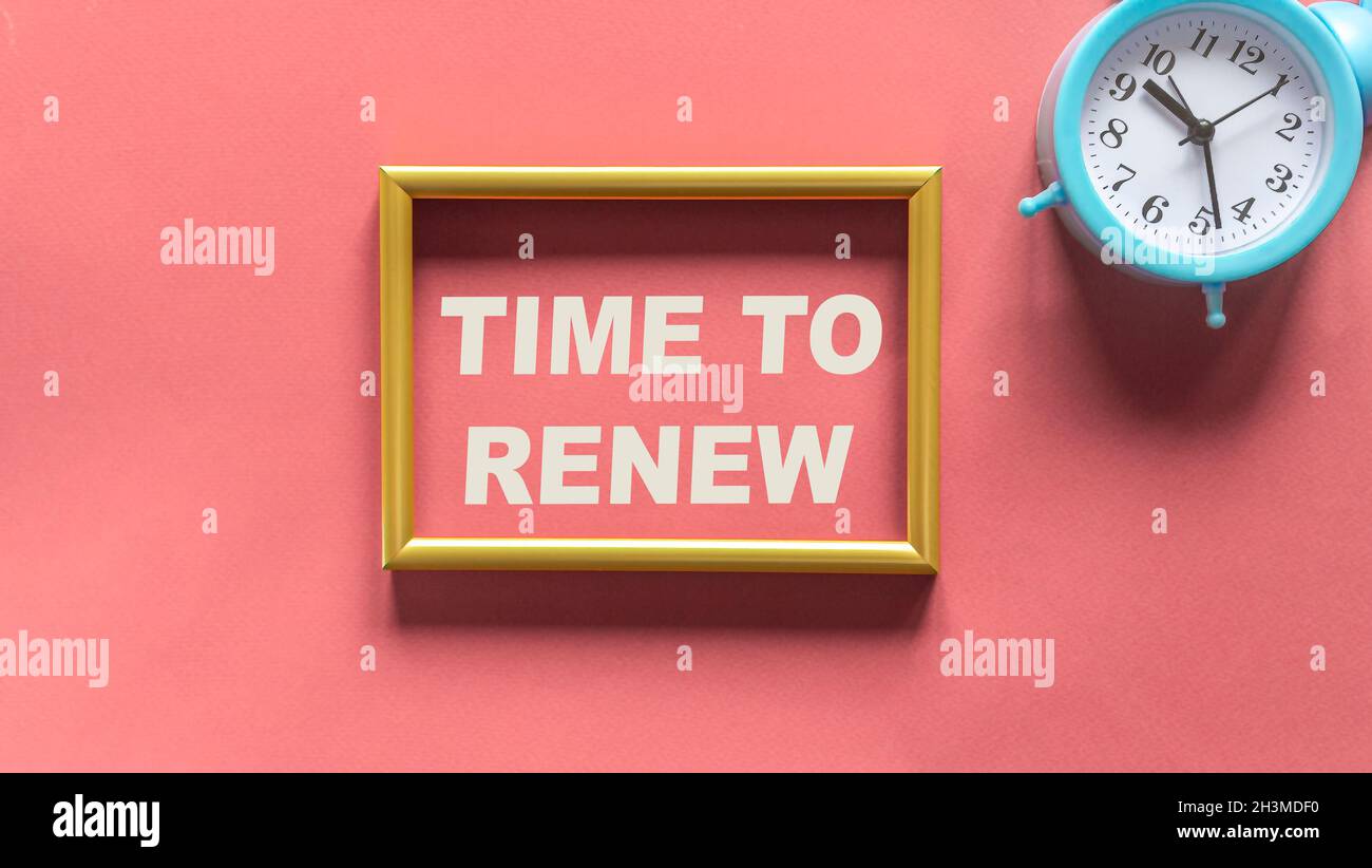 Time to renew , text in a gold frame on a pink background, near an ...