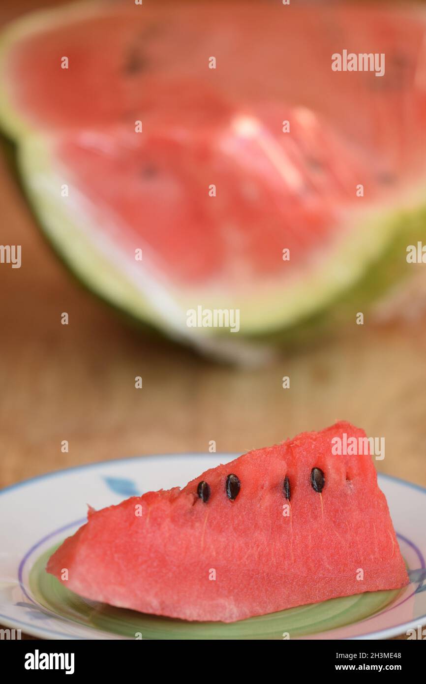 Watermelon half slice hi-res stock photography and images - Alamy