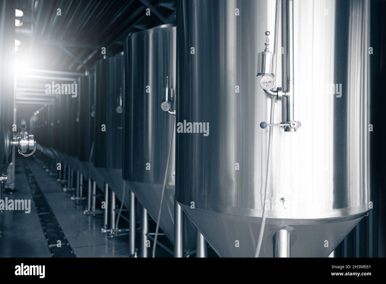 Manometers on steel cylinder storages or vats or tanks on beer and a ...