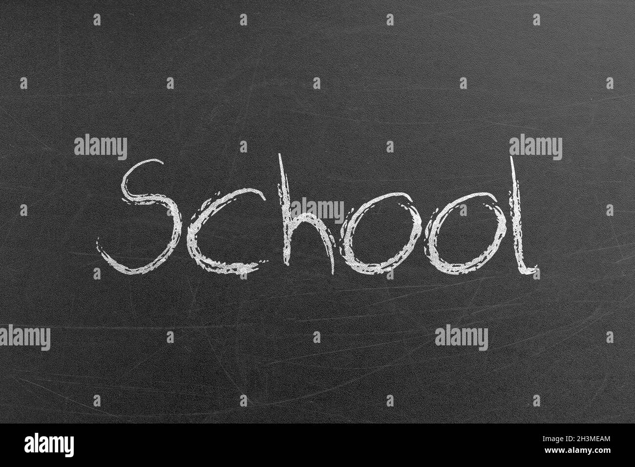 School word handwritten by chalk on a university blackboard. Back to ...