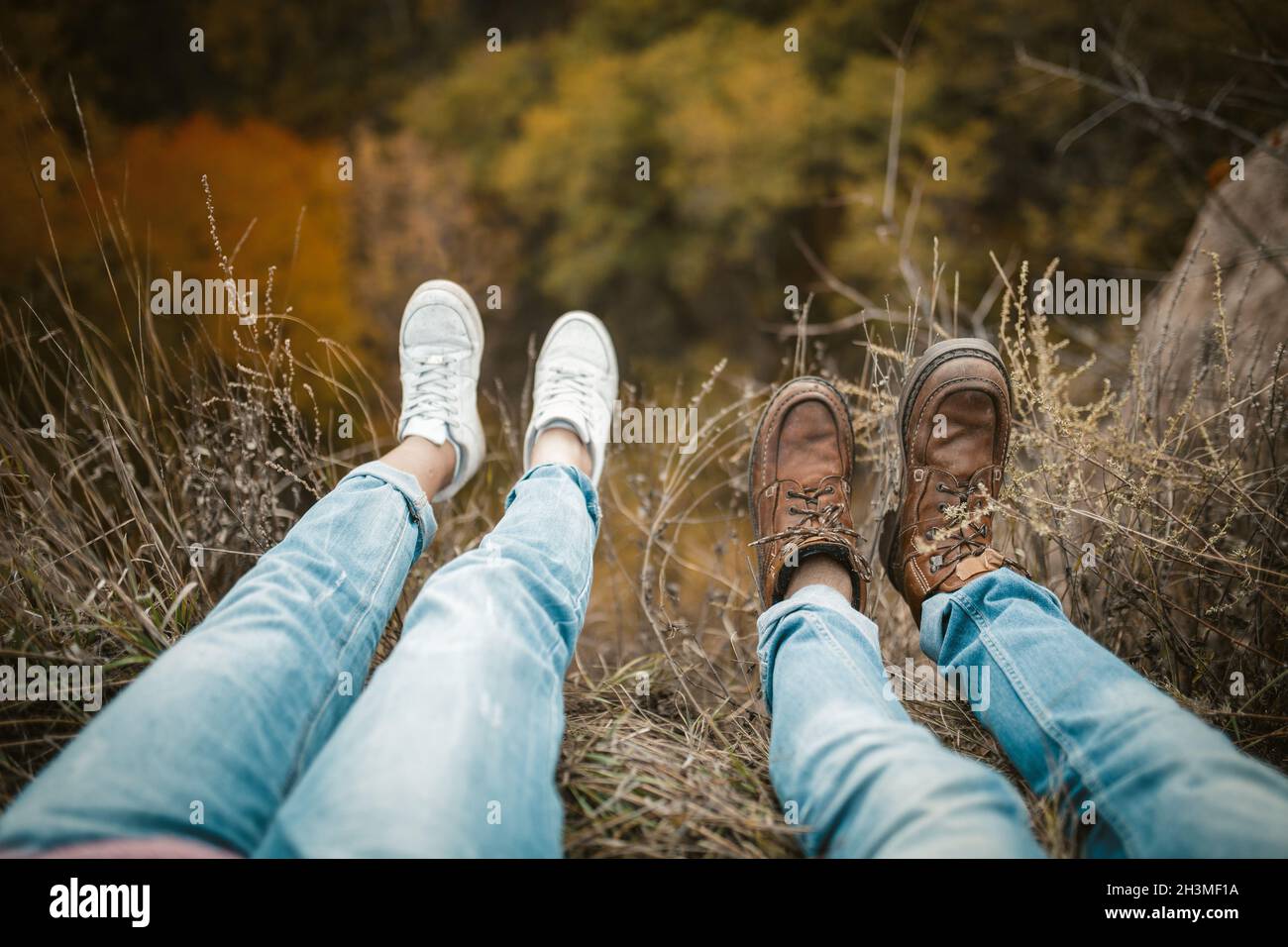 Man hanging on the edge of the cliff hi-res stock photography and ...