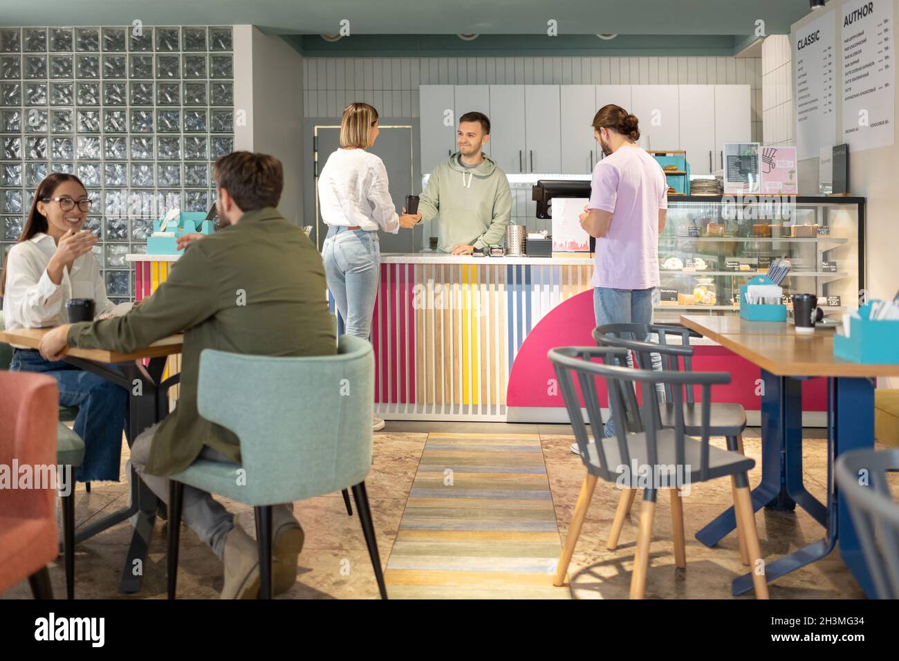 Behind counter in coffee shop hi-res stock photography and images - Alamy