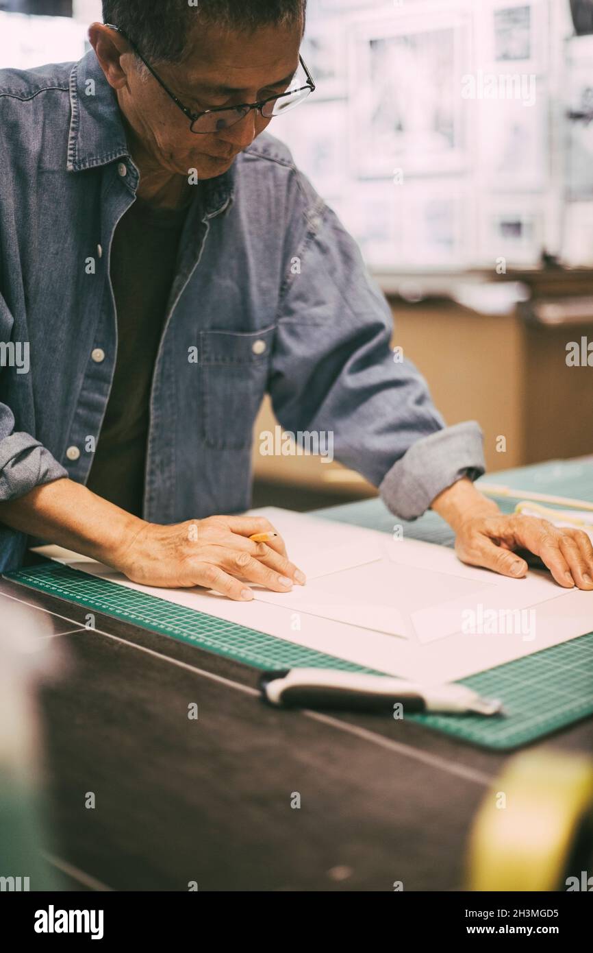 Examining papers hi-res stock photography and images - Alamy