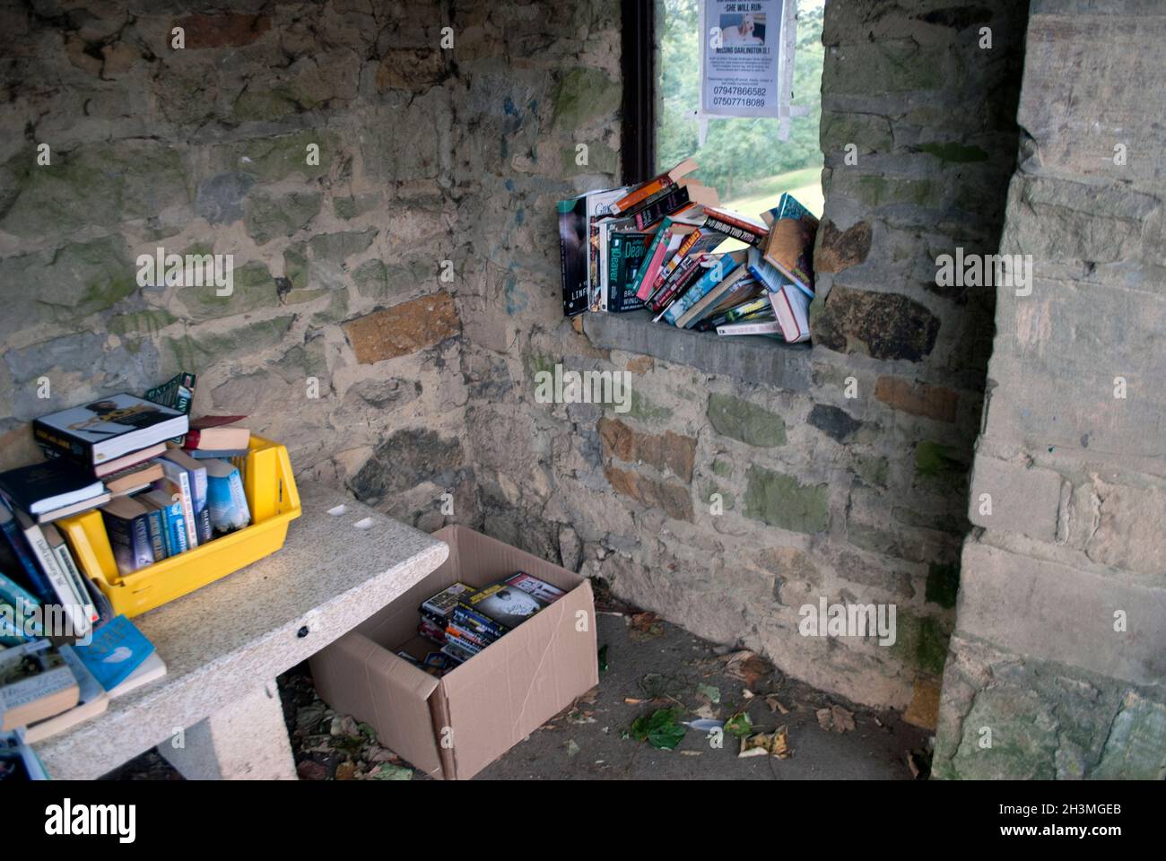 Free community library in old stone bus shelter Middle One Row ...