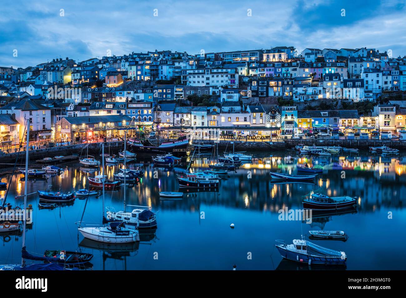 Brixham town and harbour at twilight Stock Photo - Alamy