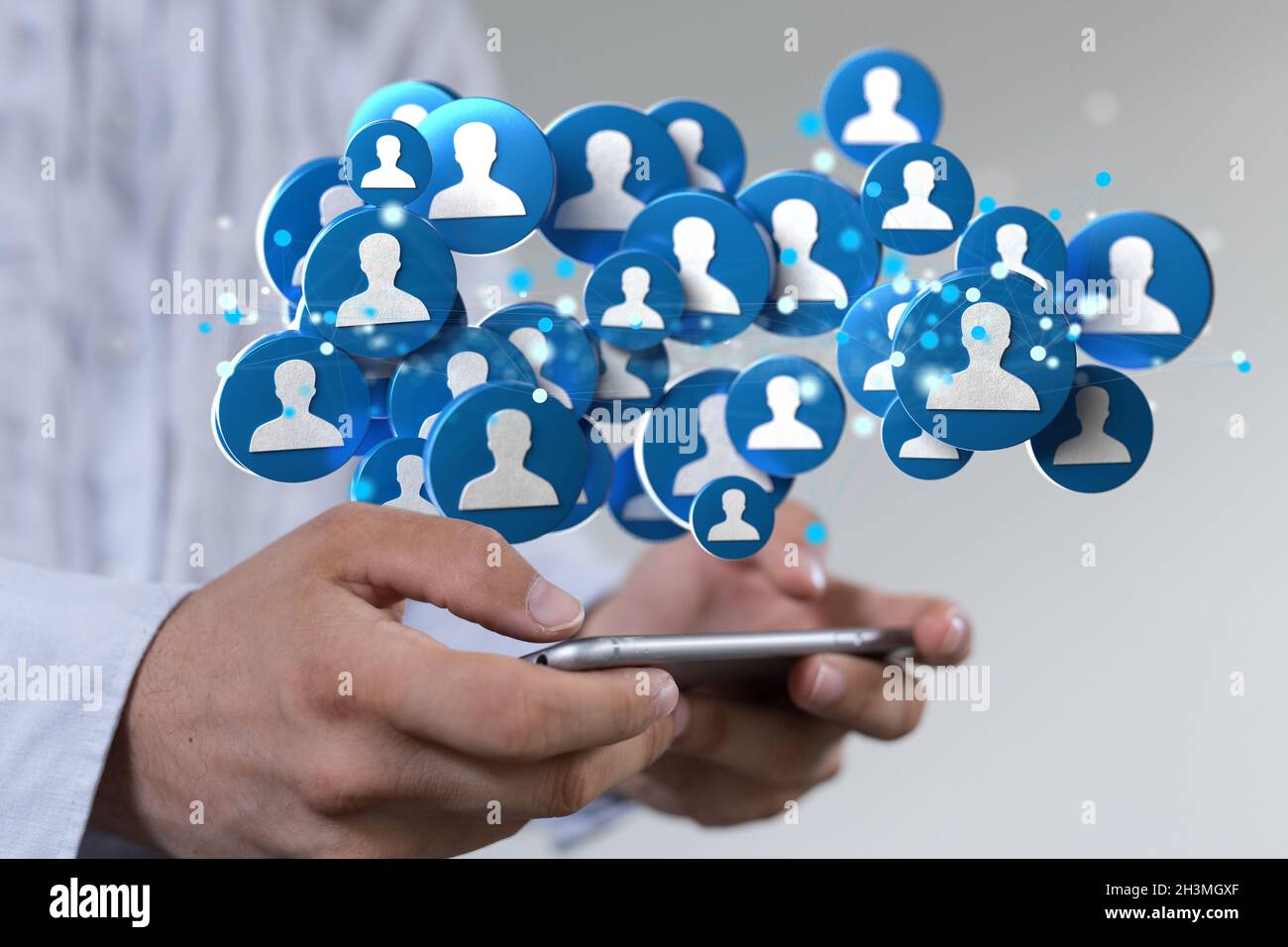 3D rendering of floating group of blue people icons on a businessman's ...