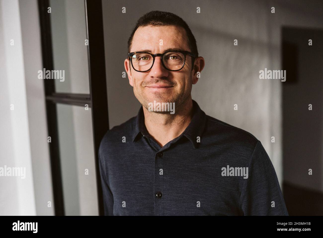 Male professional standing on hi-res stock photography and images - Alamy