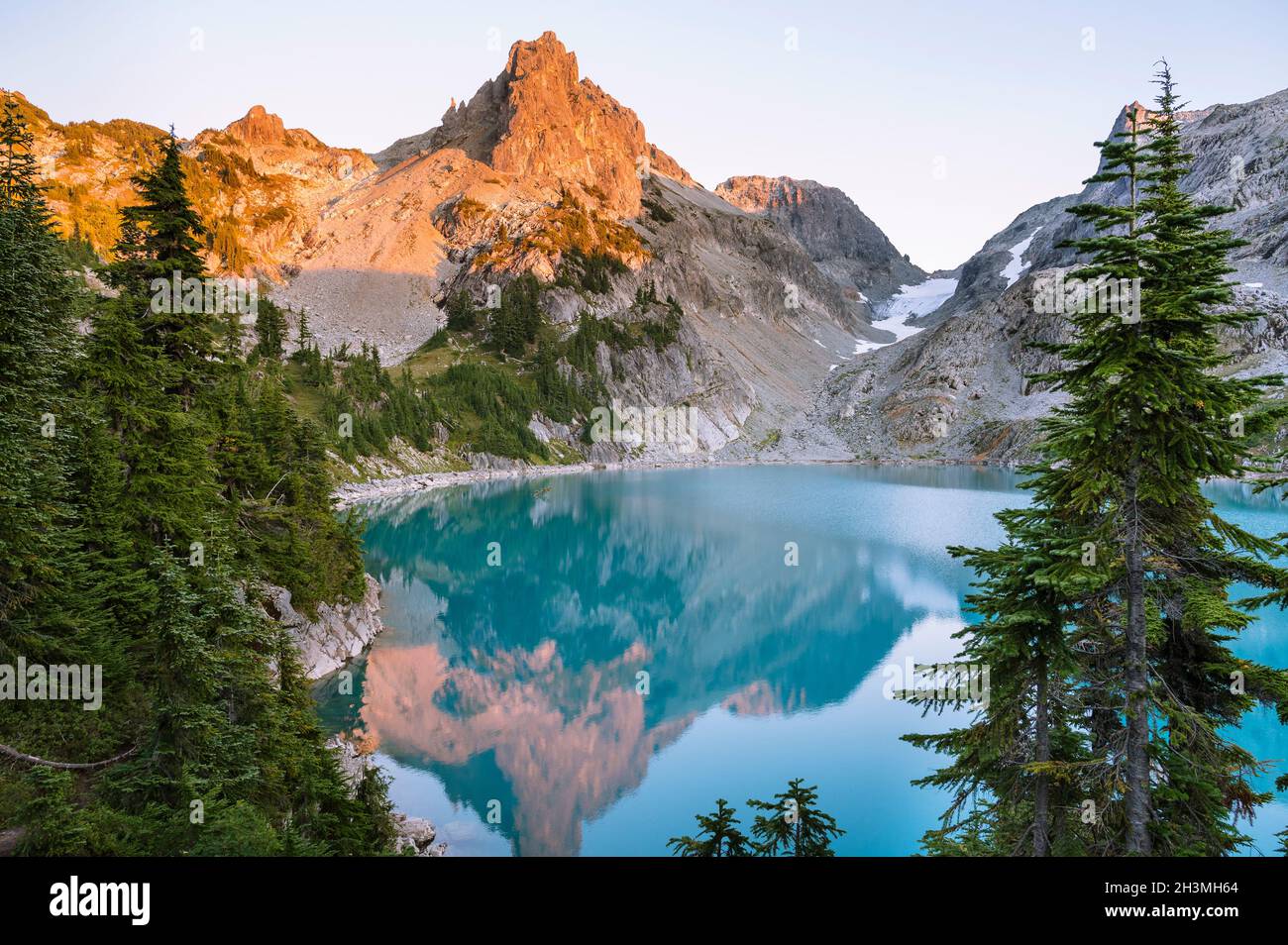 Gorgeous Blue Alpine Lake At Sunset With Glacier Carved Valley Stock ...