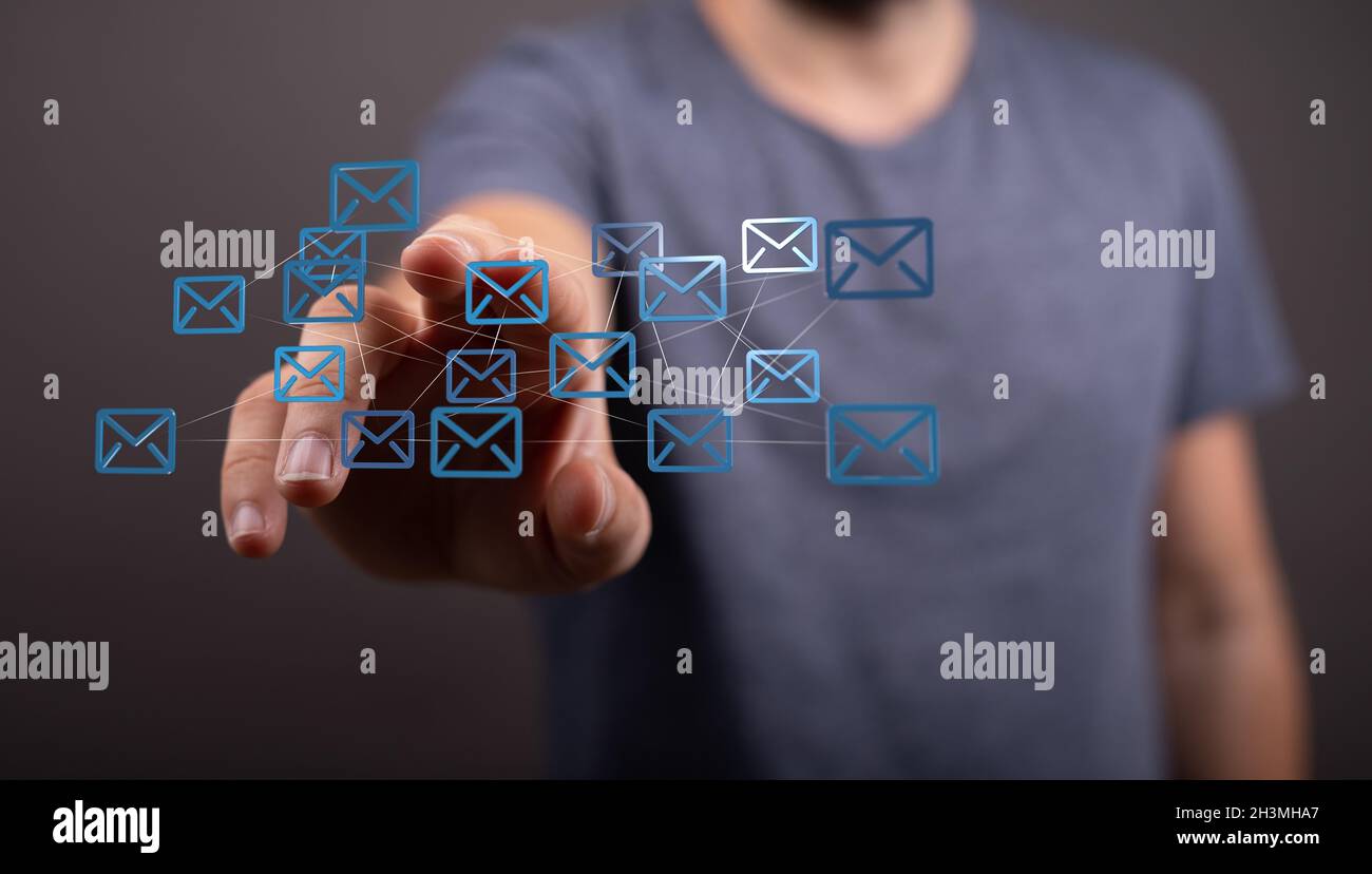 3D rendering of a man pointing at floating email icons - Concept of ...