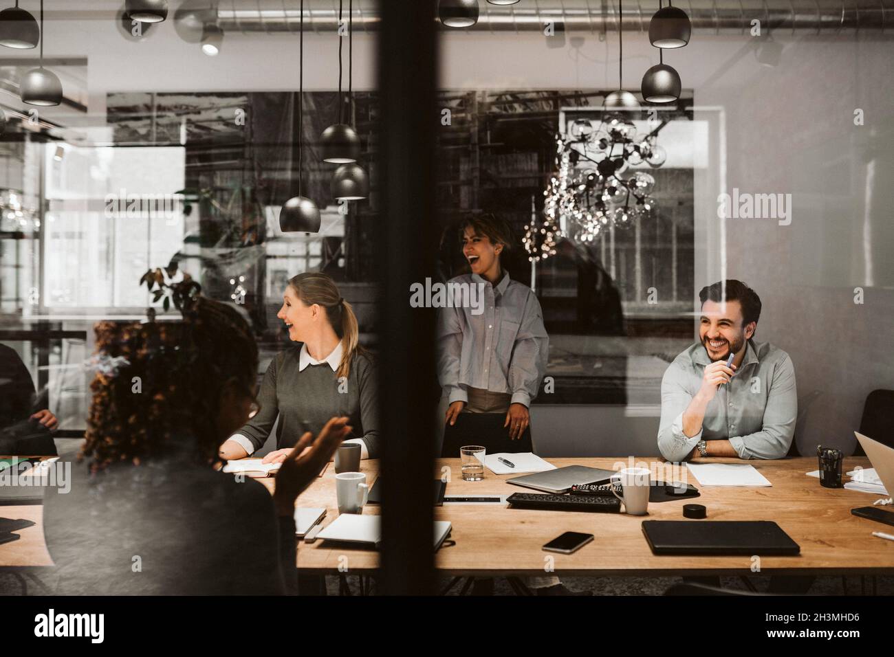 Laughing during brainstorming hi-res stock photography and images - Alamy