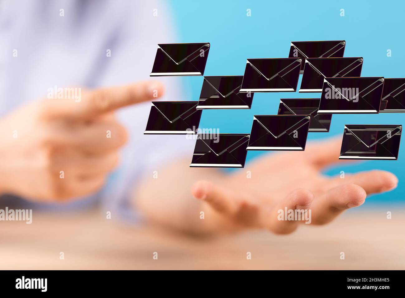 3D rendering of floating email icons on a man's hand - Concept of ...