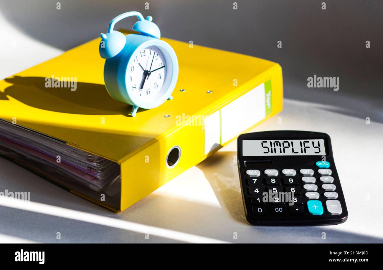 Simplify, word on calculator display. Brainstorming planning Stock ...