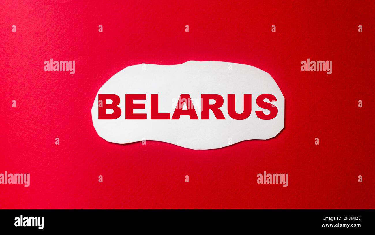 Belarus, word written on a white piece of paper and a red background ...