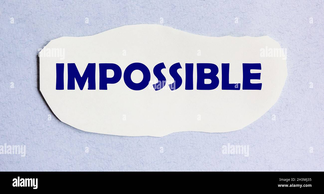 Impossible word written on a piece of paper Motivation philosophy ...