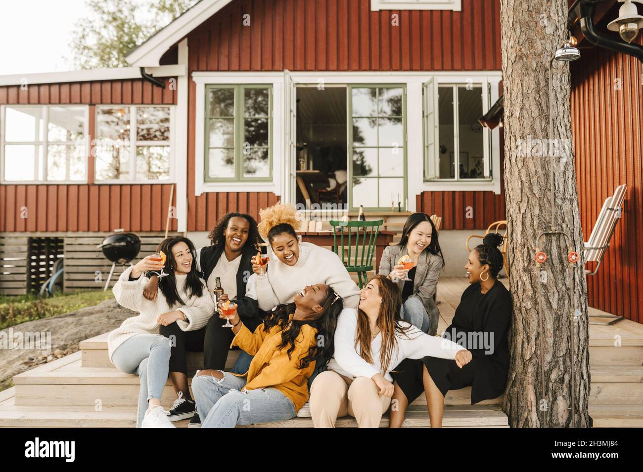 Group happy female friends house hi-res stock photography and images ...