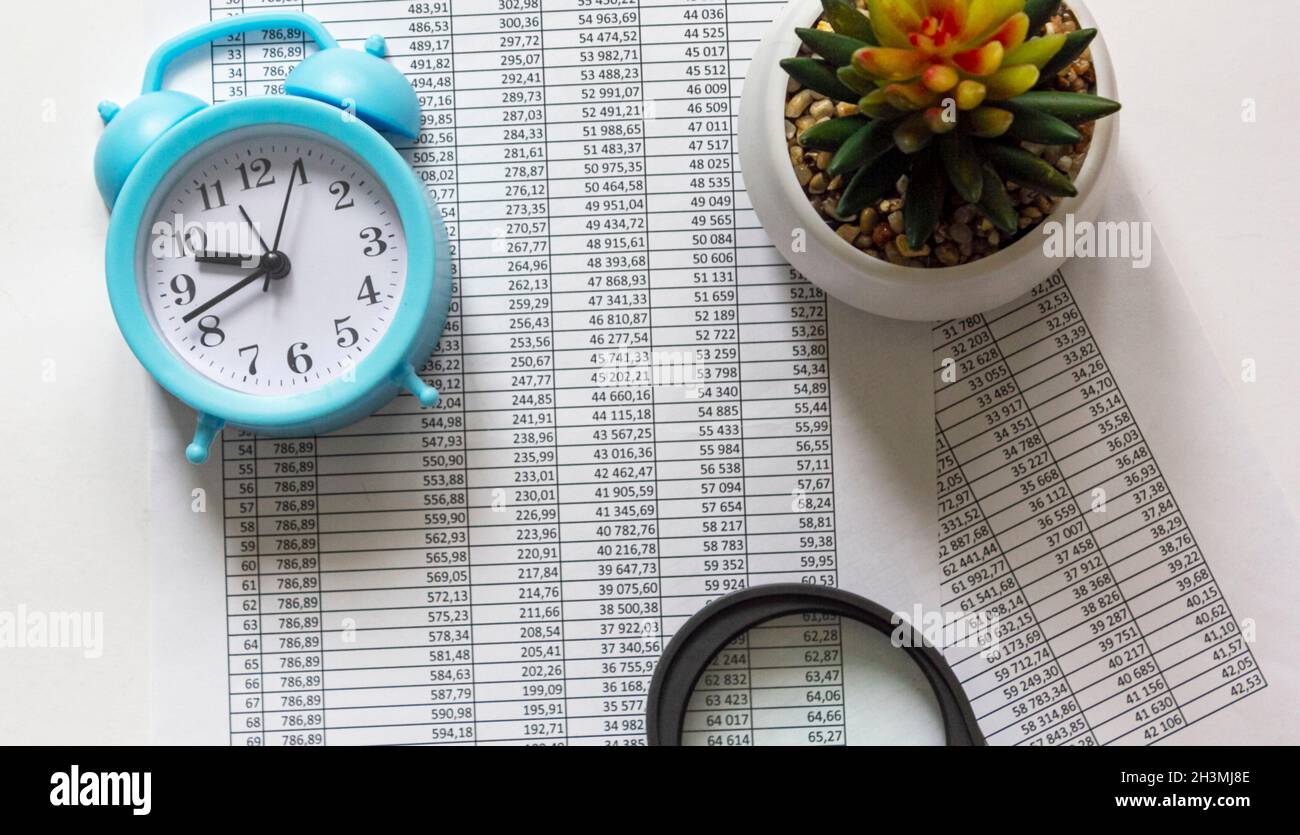 Alarm clock, cactus flower, magnifier on the graphics background Stock ...