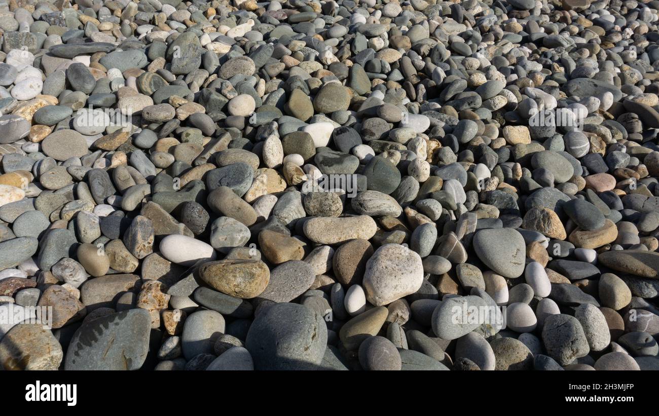 Sea stones background with small pebbles or stone in garden or in the ...