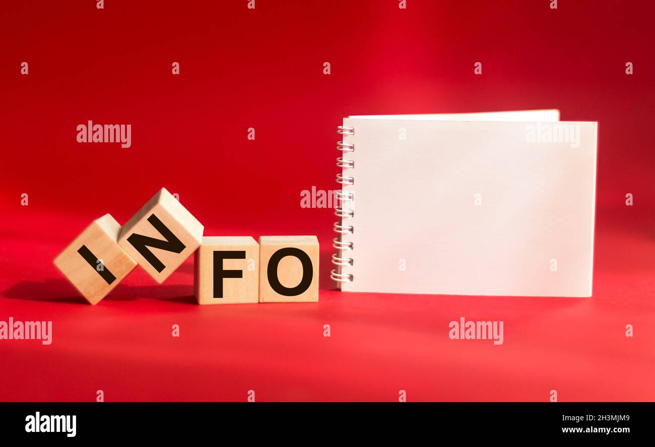 The word Info on wooden cubes and a red background, next to a blank ...