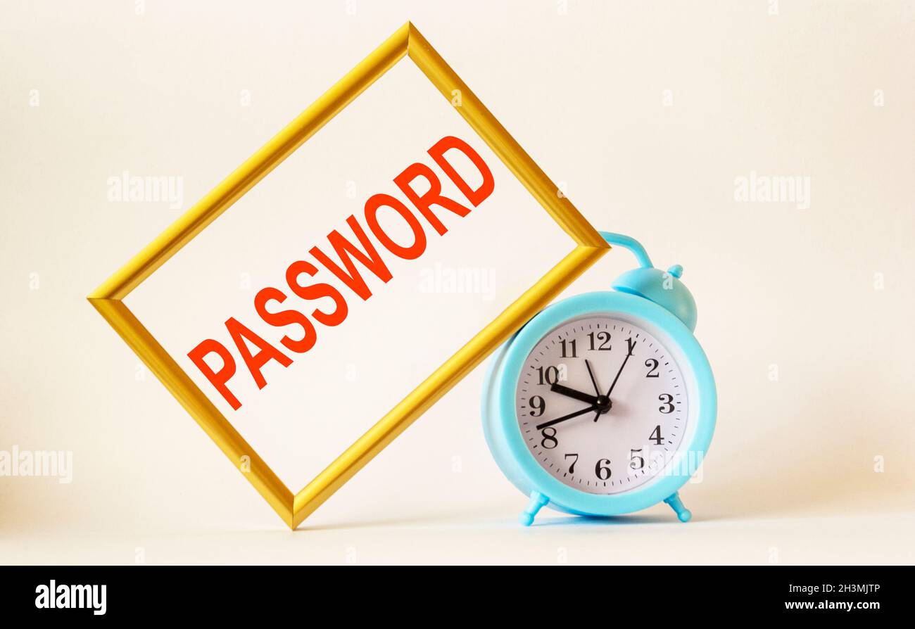 The word Password is written on the photo frame next to the alarm clock ...